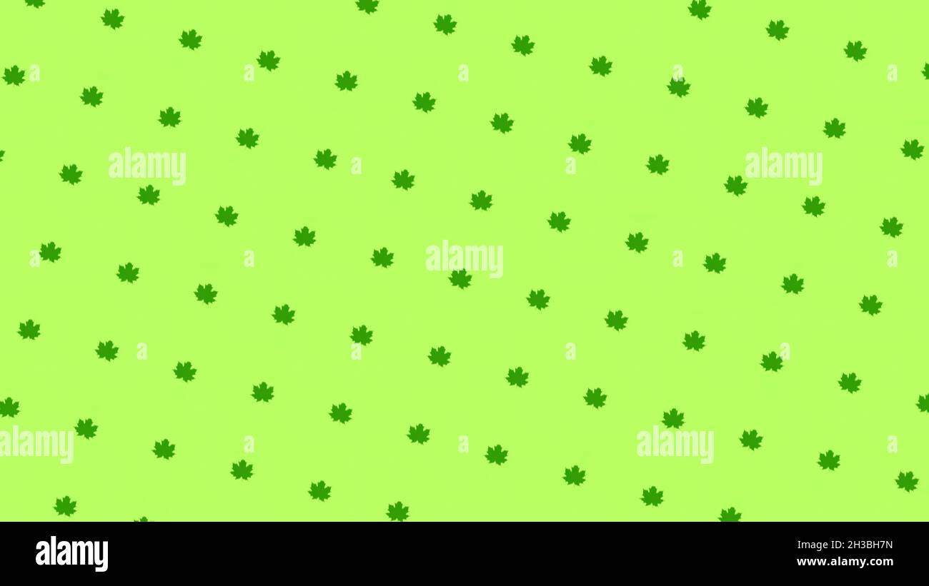 Abstract colorful pattern of small green leaves rotating and moving up ...