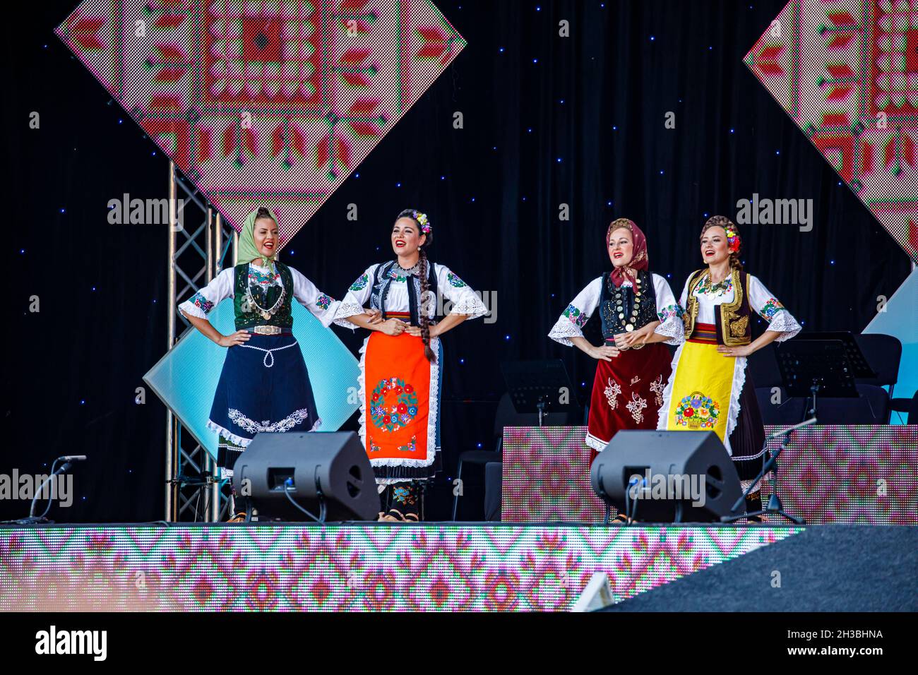 Romanian People in folkloric dress at the folkloric festival in Sibiu ...