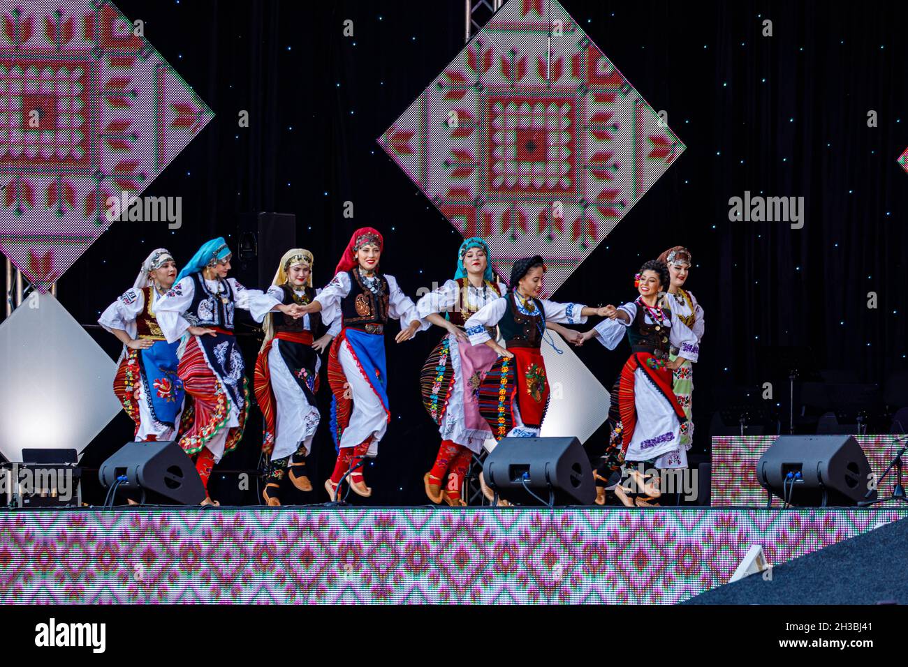 Romanian People in folkloric dress at the folkloric festival in Sibiu ...