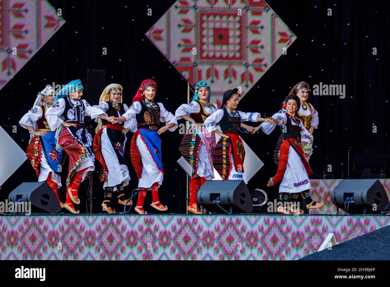 Romanian People in folkloric dress at the folkloric festival in Sibiu ...