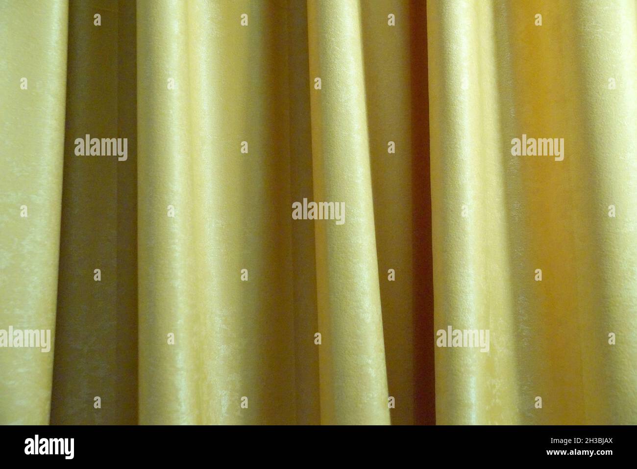 gold draped curtain close up for textile background Stock Photo - Alamy