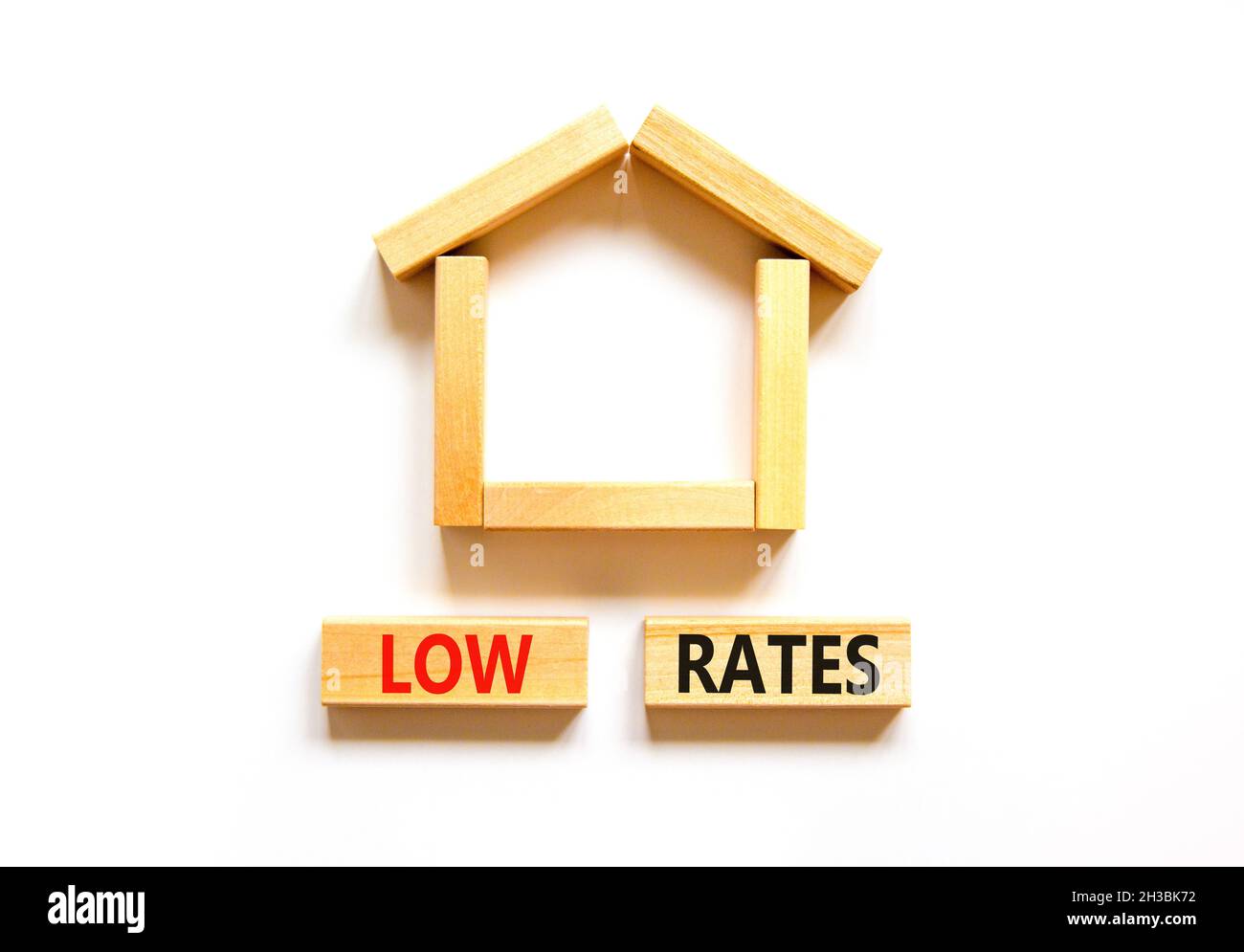 Low house rates symbol. Concept words 'Low rates' on wooden blocks near ...