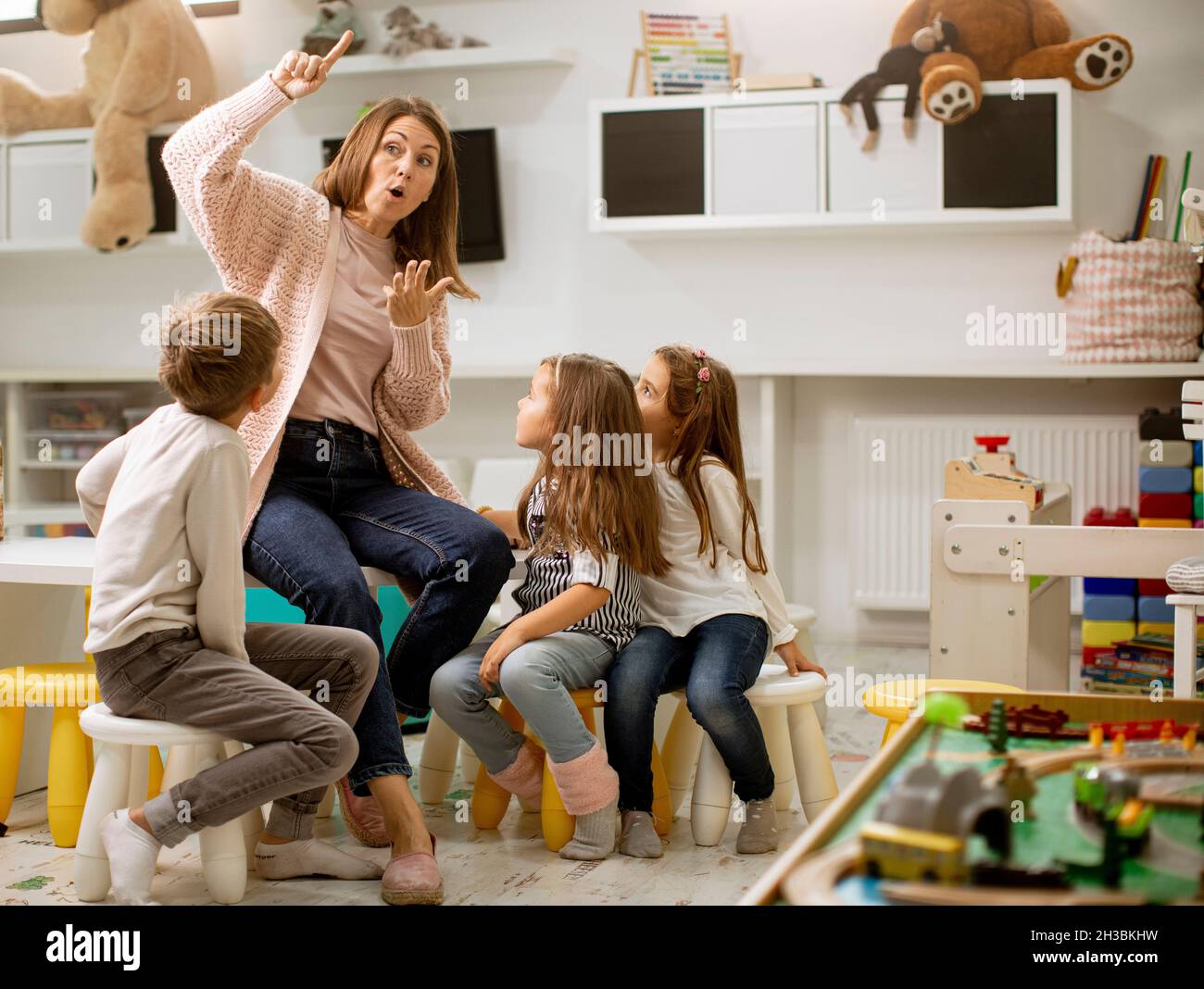 Nursery children talking hi-res stock photography and images - Alamy