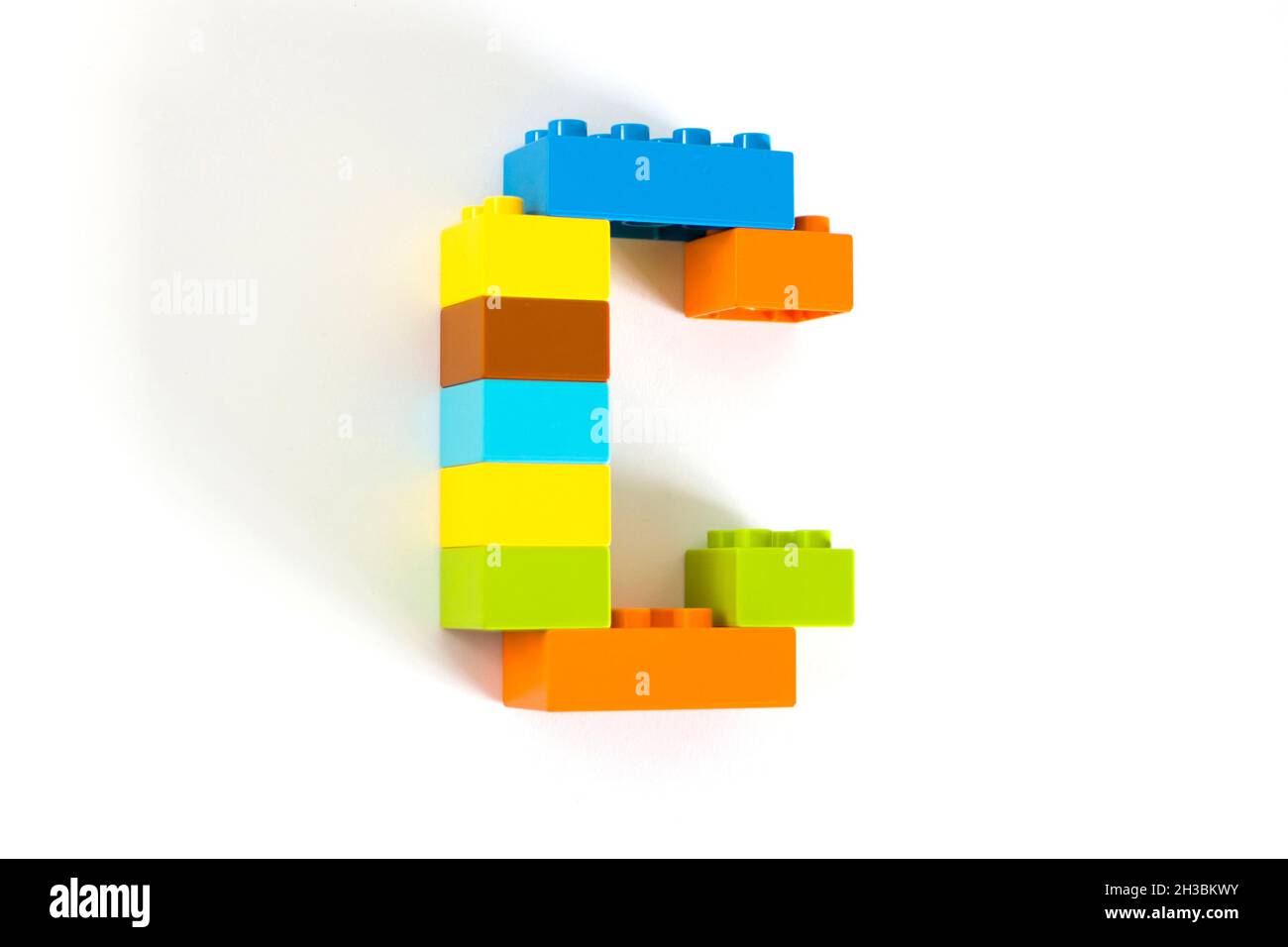 Colorful toy brick letter C isolated on the white background Stock ...