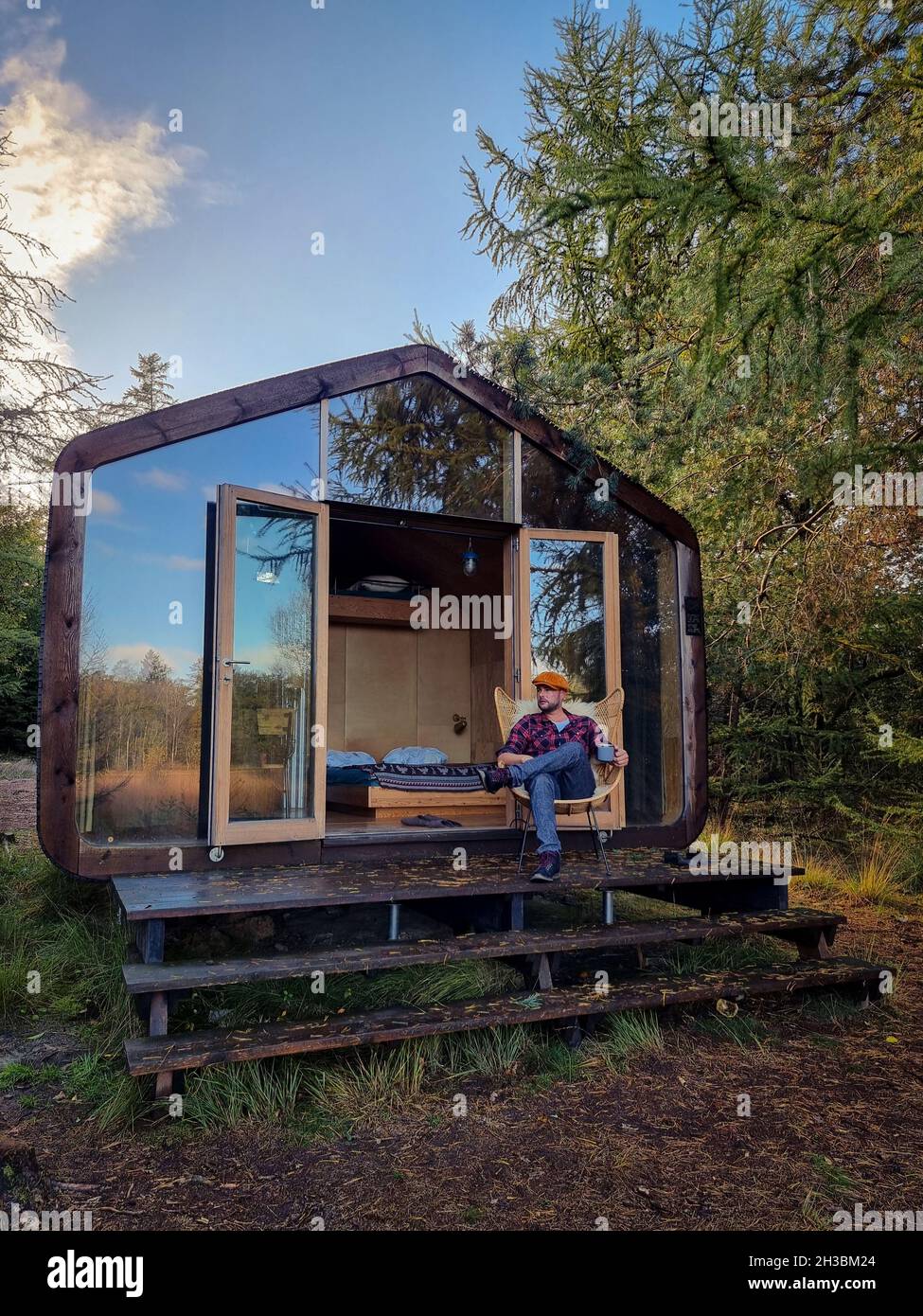 Wooden hut in an autumn forest in the Netherlands, cabin off grid ...