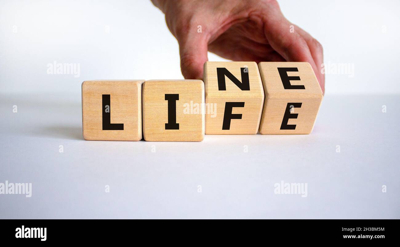Lifeline, line of life symbol. Businessman hand turns cubes and changes ...