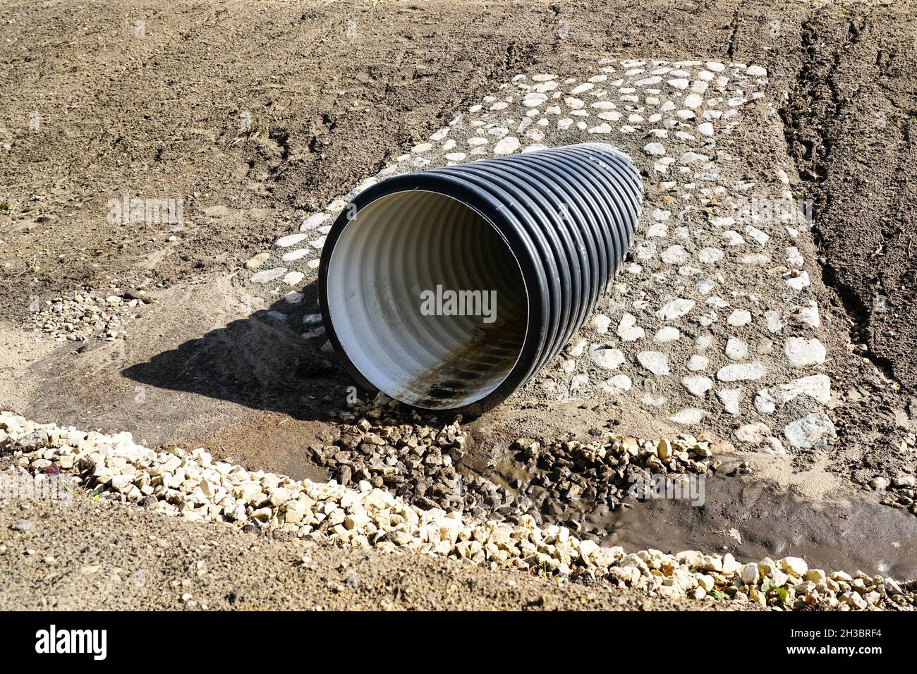 a new modern plastic culvert under the highway with a decorative ...
