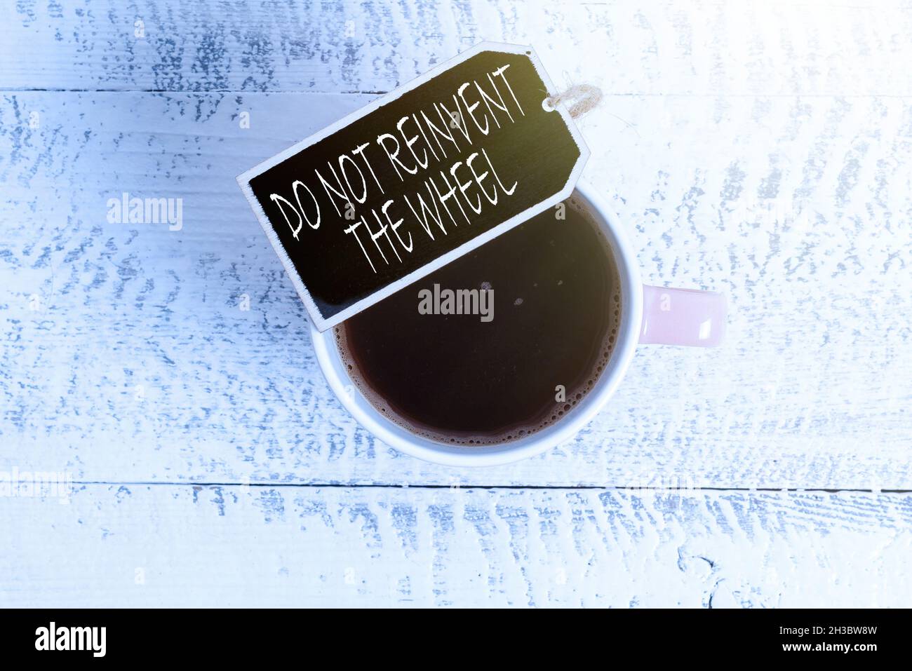 Handwriting text Do Not Reinvent The Wheel. Word Written on stop ...