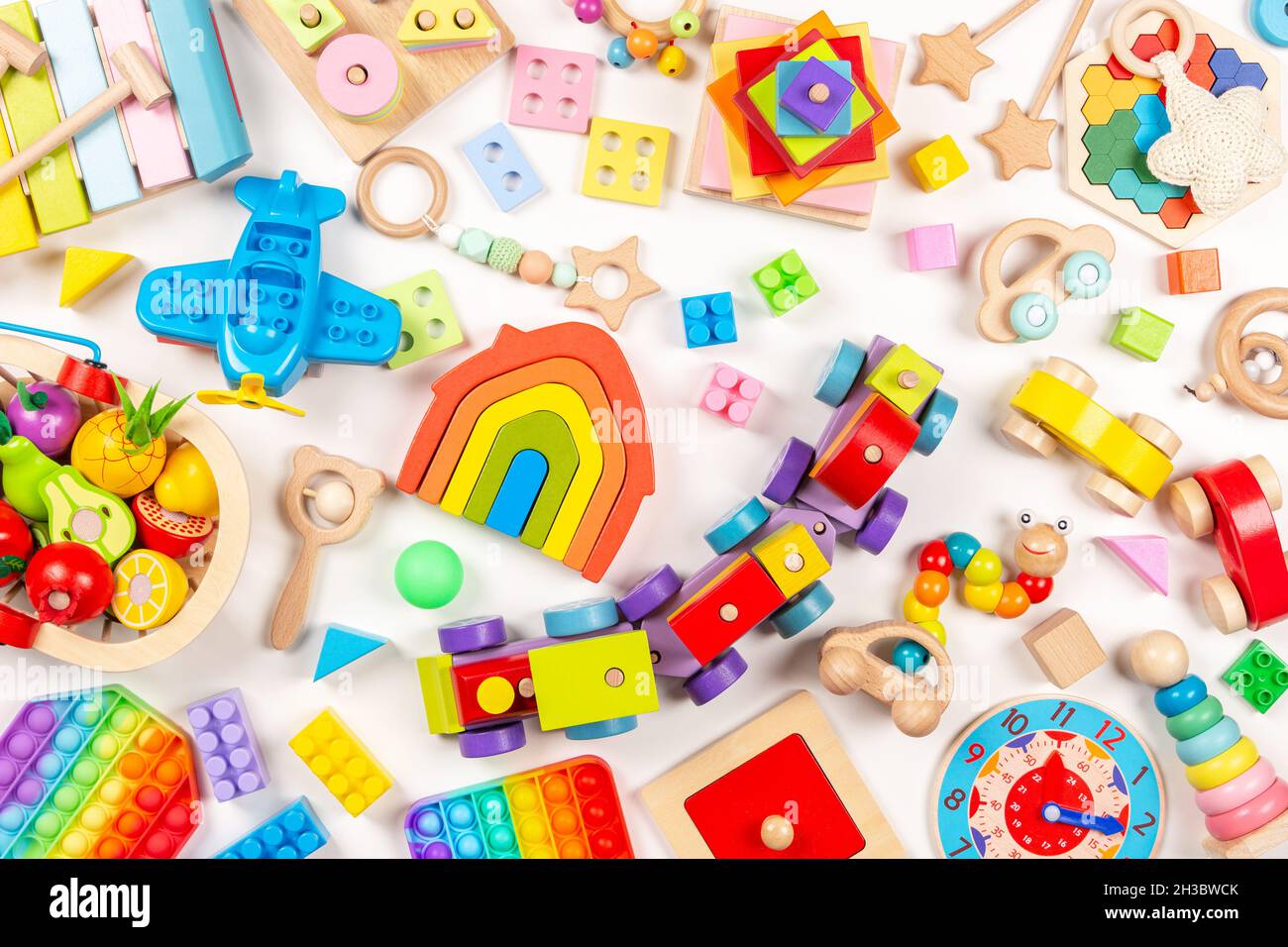 Baby kids toys background. Many colorful educational wooden, plastic ...