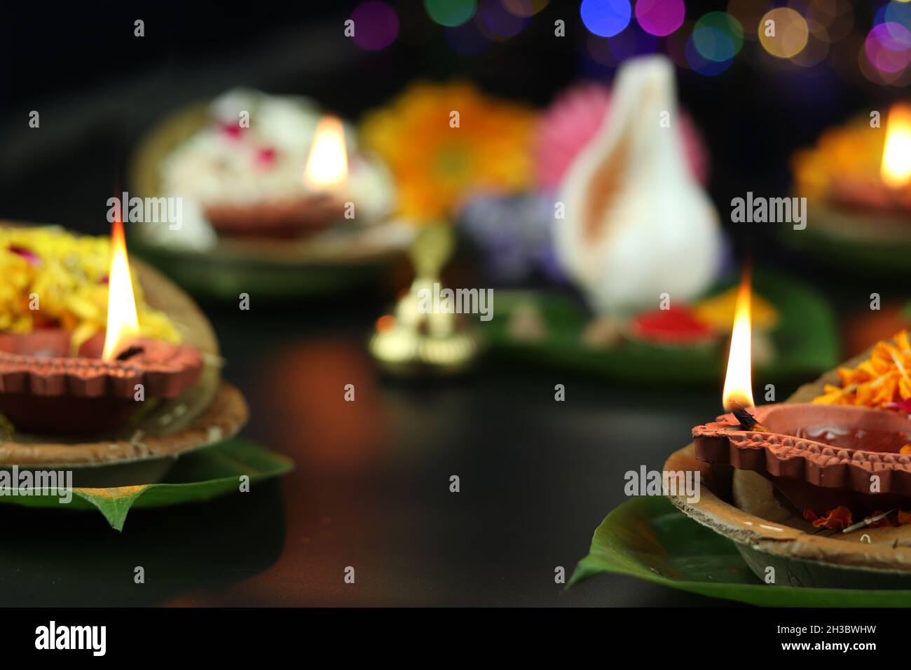 Diya Or Deep Lit In Leaf bowls On Called Patravali or Pattal Dona ...