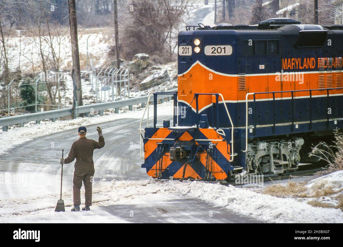 Maryland Midland Railroad crossing road in snow Stock Photo - Alamy