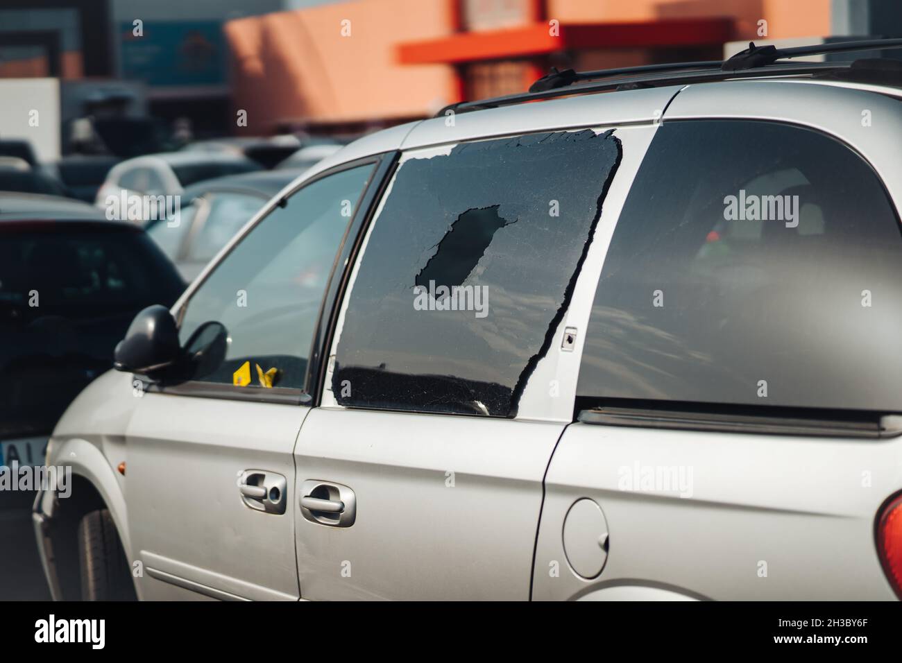 Theft from a parked car, intruders broke the rear window Stock Photo ...