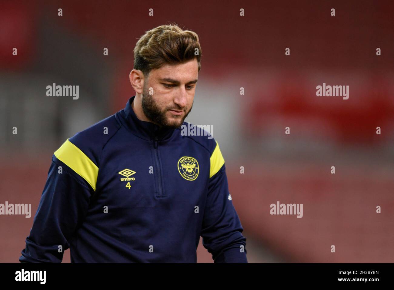 Charlie Goode #4 of Brentford warming up before the game Stock Photo ...