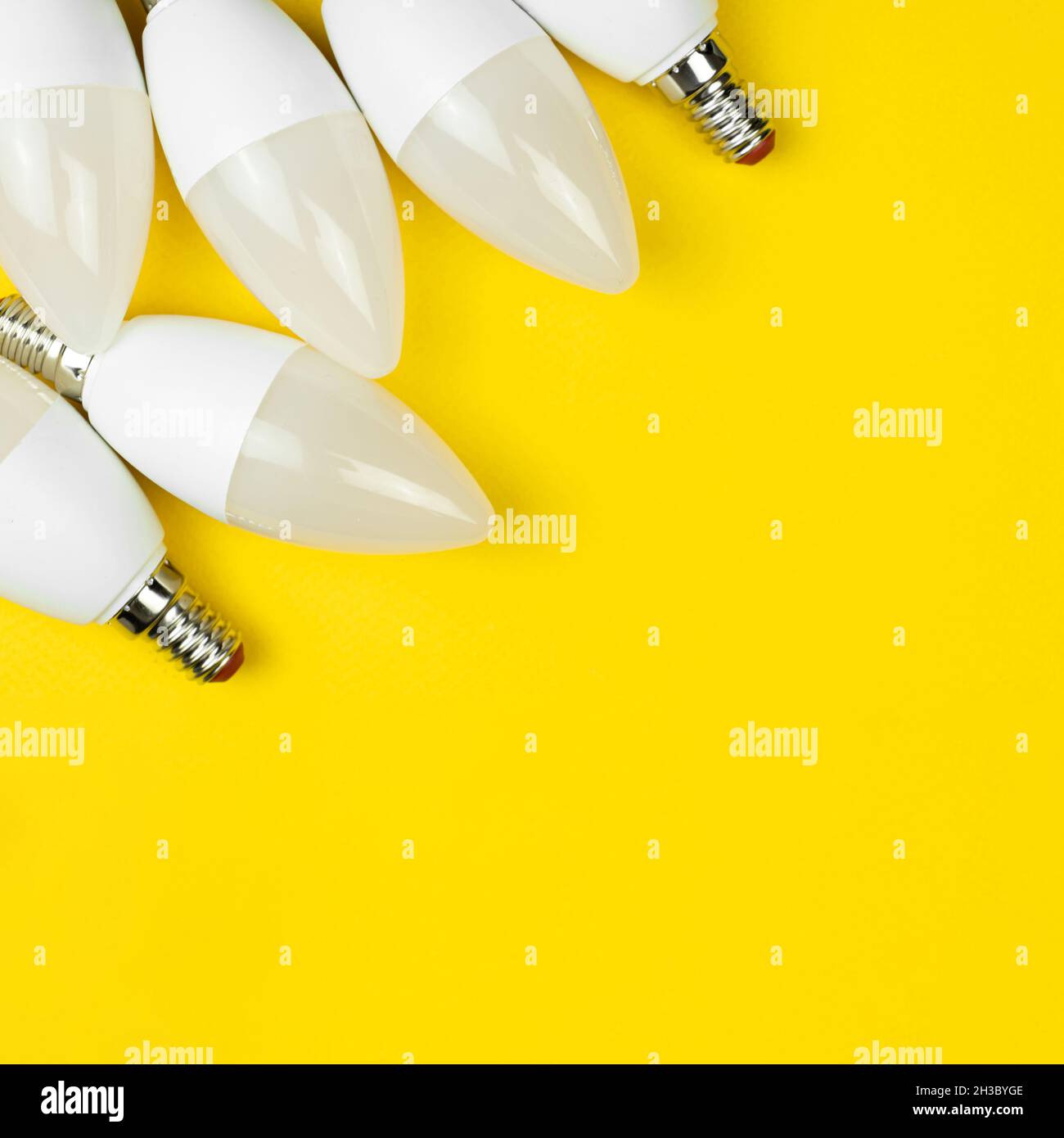 LED light bulbs, yellow background. Energy-saving and eco friendly ...