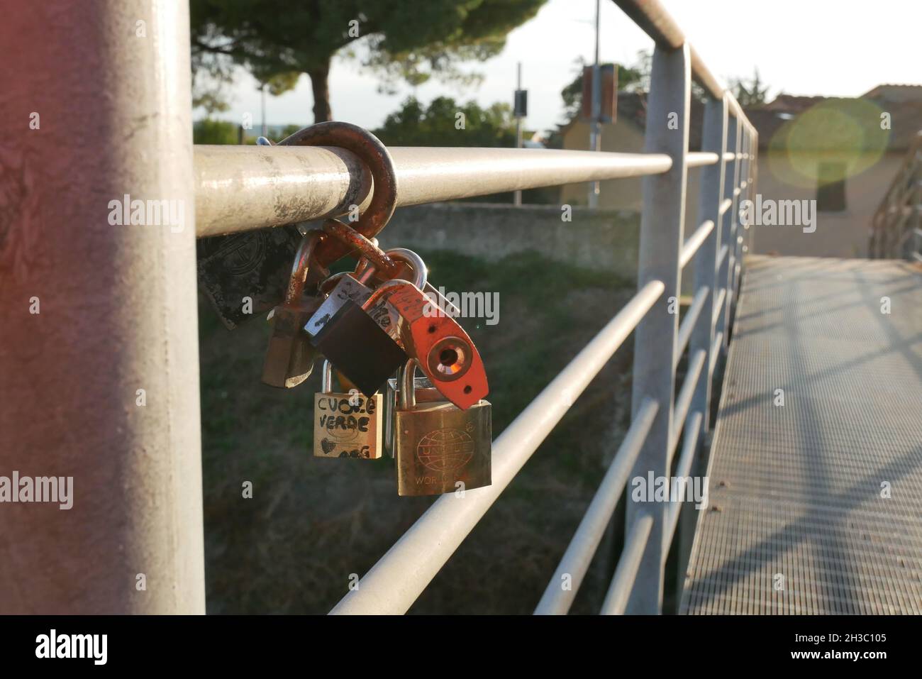 Closeup shot of locks on a metal fence outside Stock Photo - Alamy