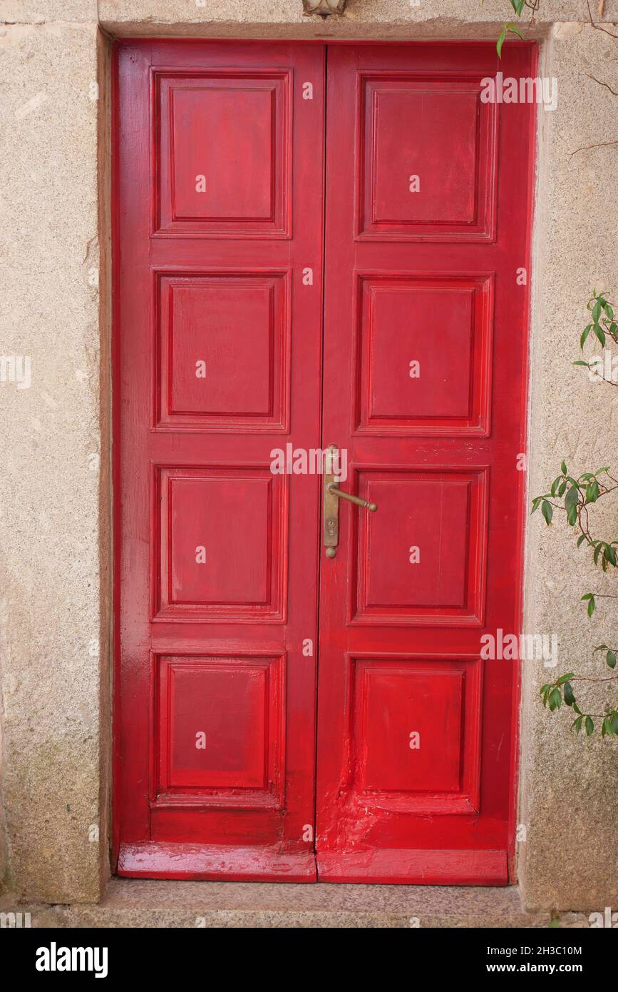 Vertical shot of a wooden red door Stock Photo - Alamy