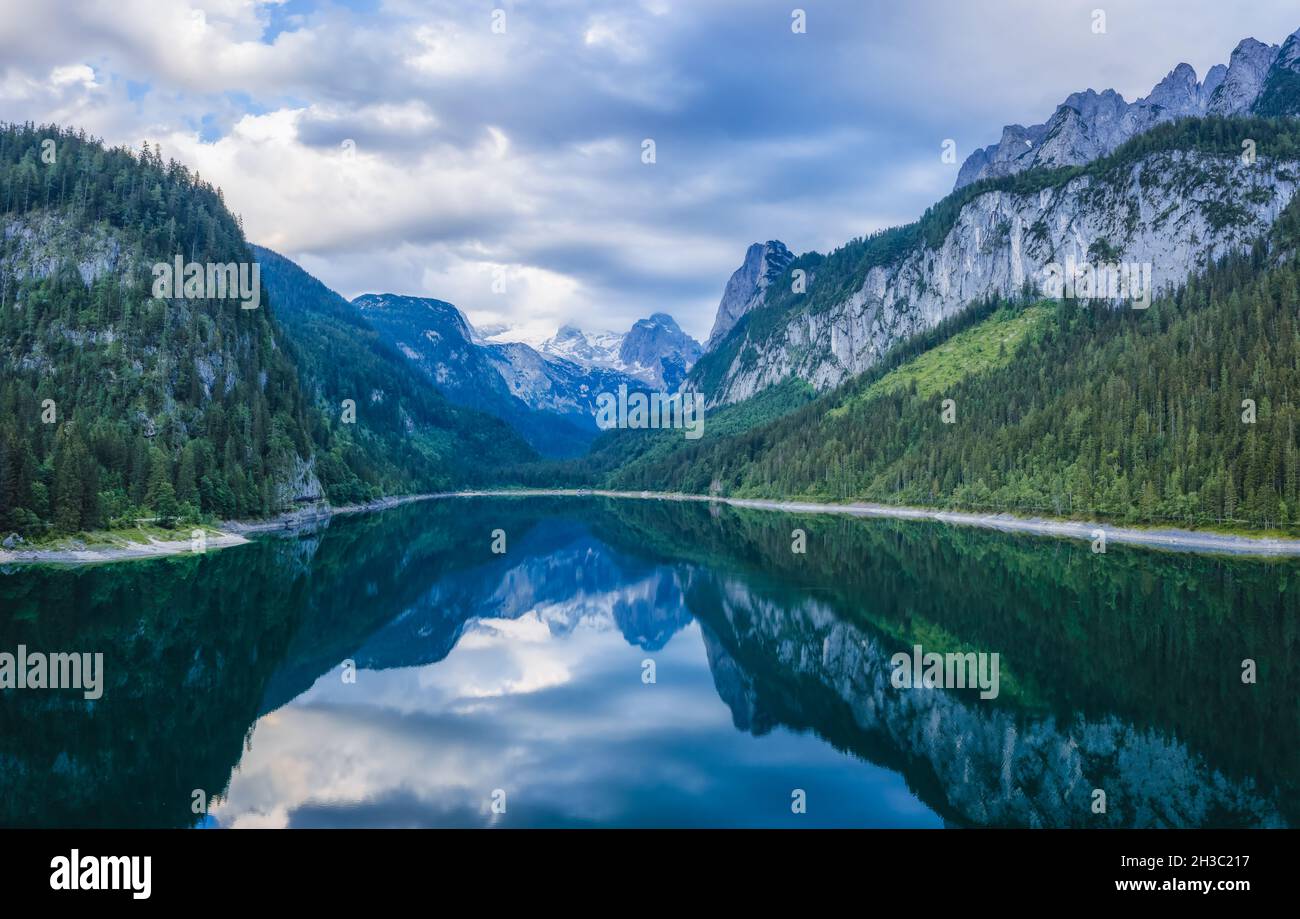 Aerial view of Gosau lake and Dachstein summit mountain range and ...