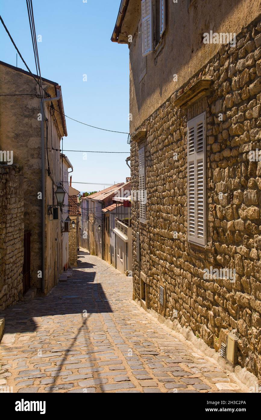 Houses in a quiet residential street in the historic medieval centre of ...