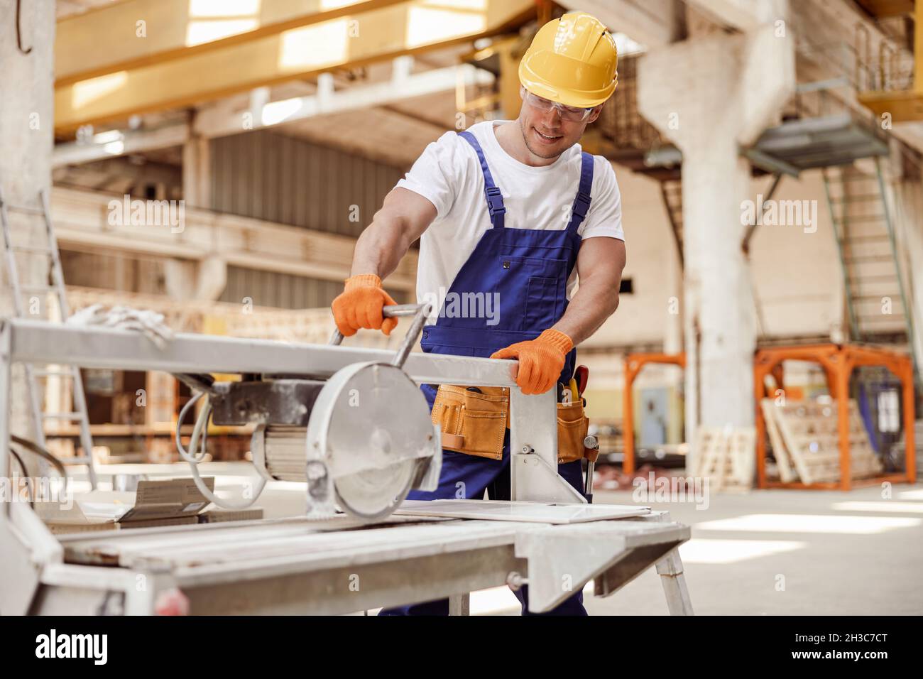 Cheerful construction worker in hi-res stock photography and images - Alamy