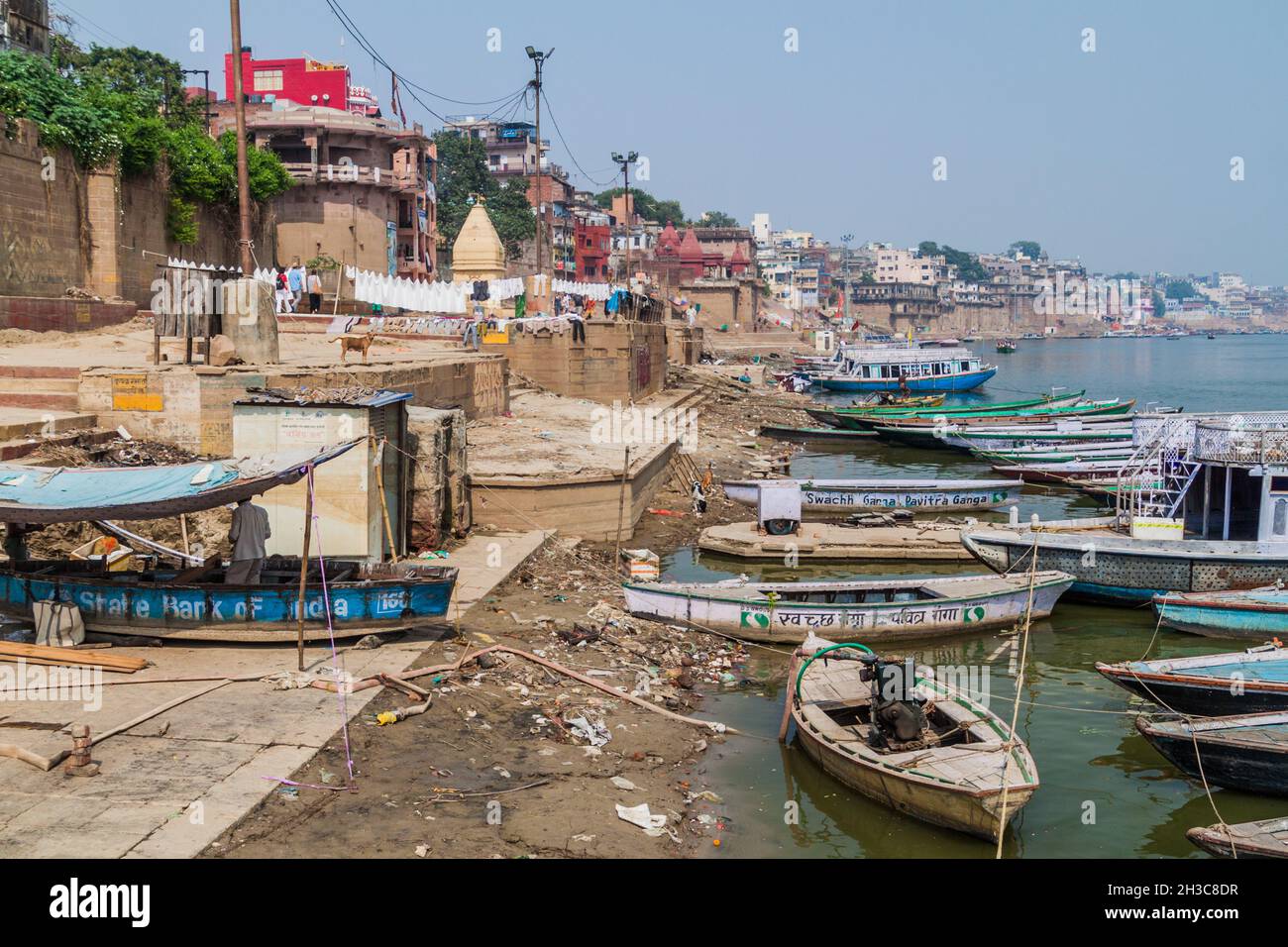 VARANASI, INDIA - OCTOBER 25, 2016: View of Ghats riverfront steps ...
