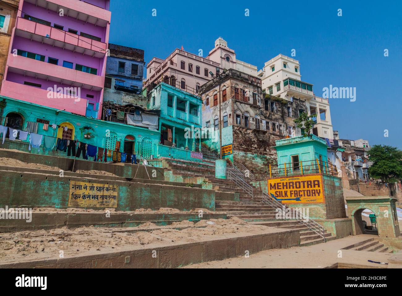 VARANASI, INDIA - OCTOBER 25, 2016: View of houses at sacred river ...