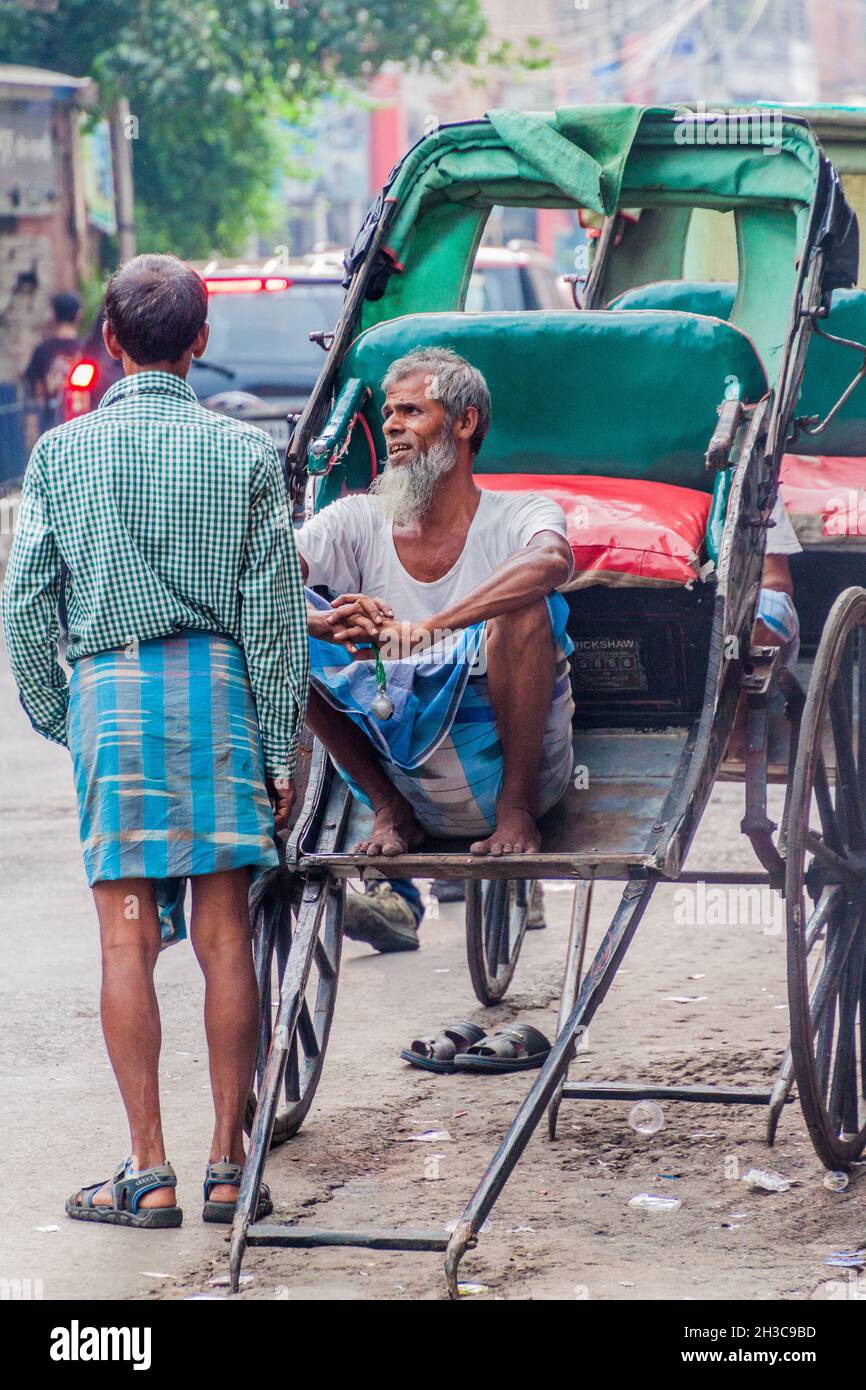 Hand rickshaw puller in india hi-res stock photography and images - Alamy
