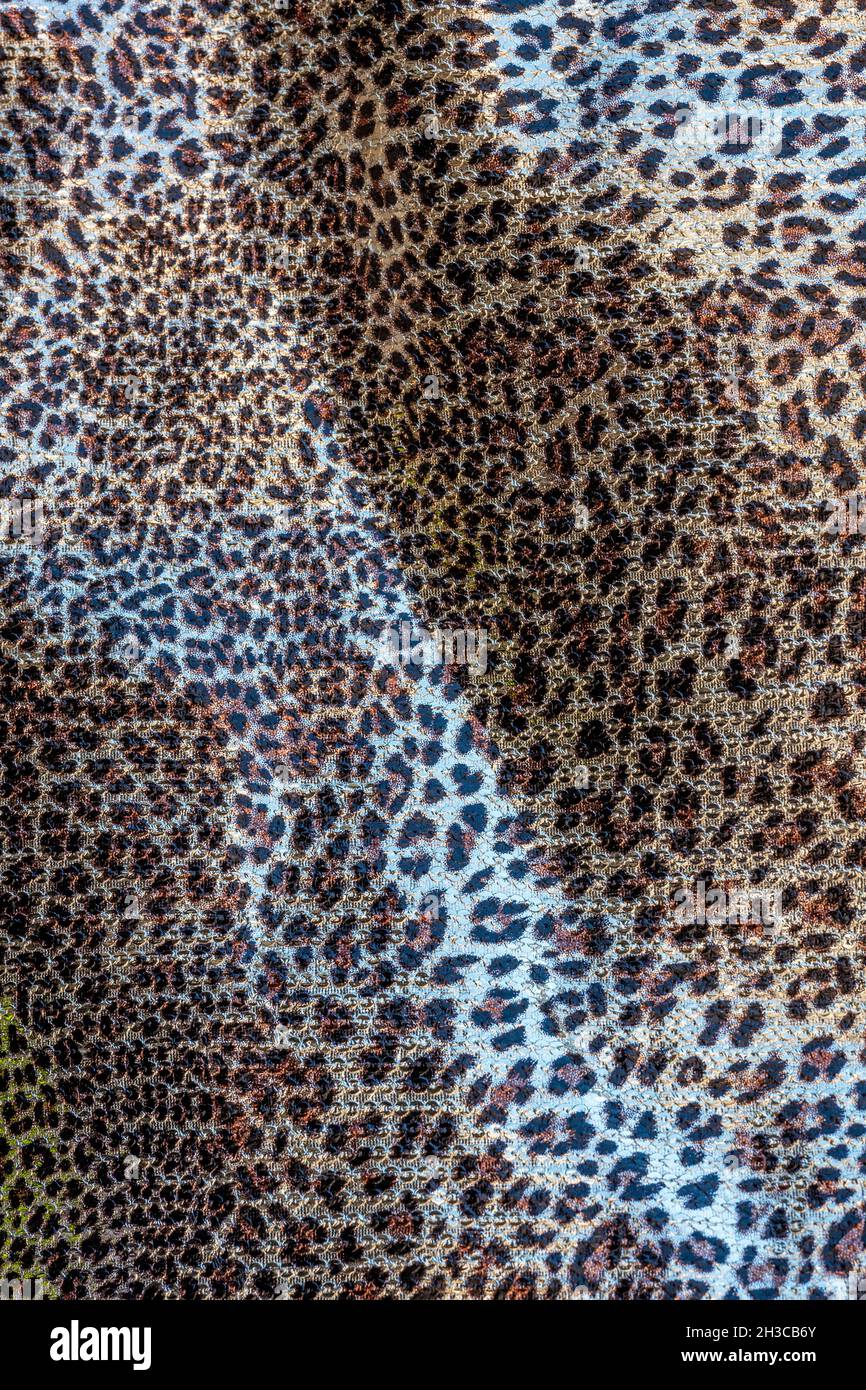 leopard print fabric with a sheen or texture. crumpled leopard print ...