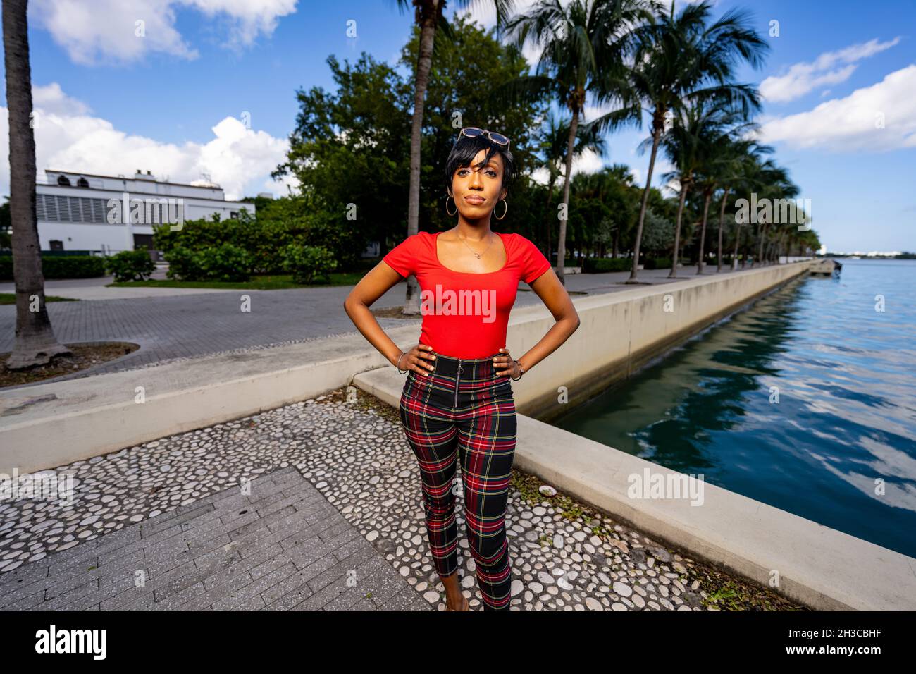 Photo of a beautiful female model posing outdoors in a park scene Stock ...