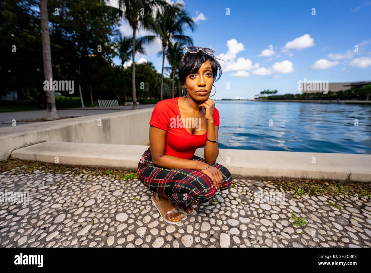 Photo of a beautiful female model posing outdoors in a park scene Stock ...