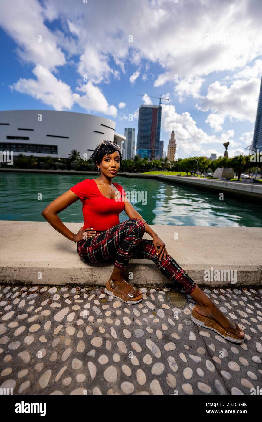 Photo of a beautiful female model posing outdoors in a park scene Stock ...