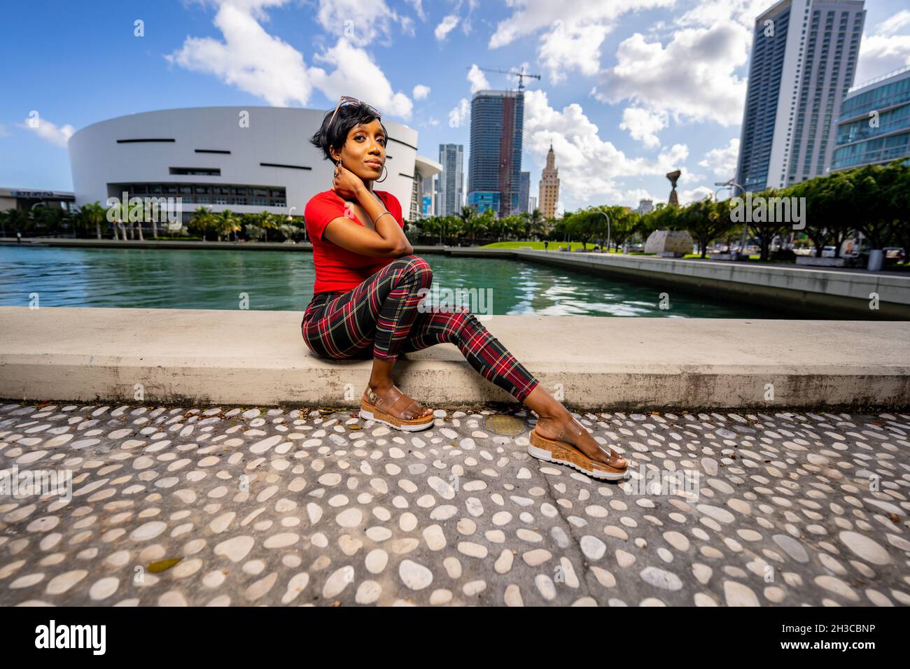 Photo of a beautiful female model posing outdoors in a park scene Stock ...