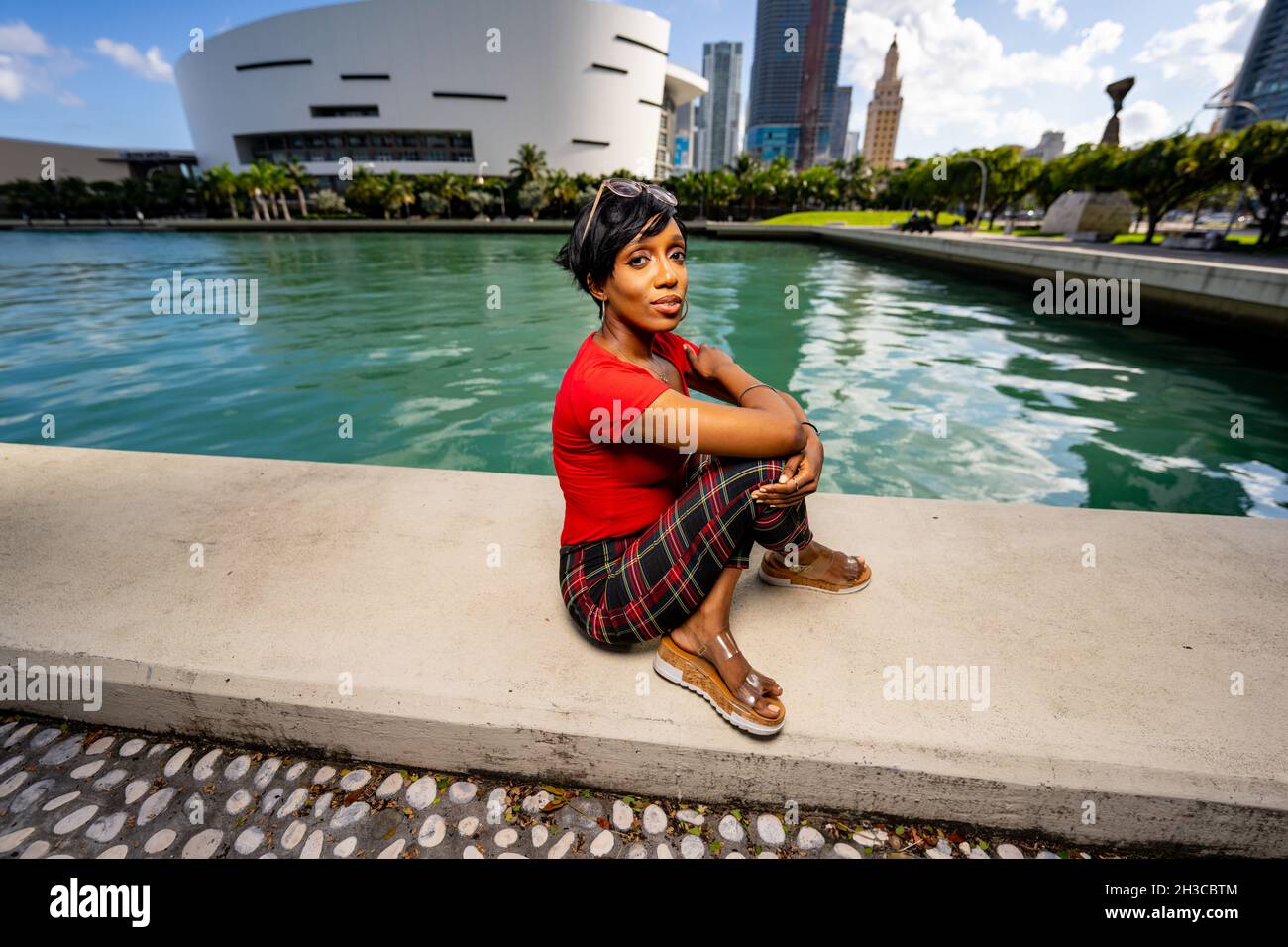 Photo of a beautiful female model posing outdoors in a park scene Stock ...