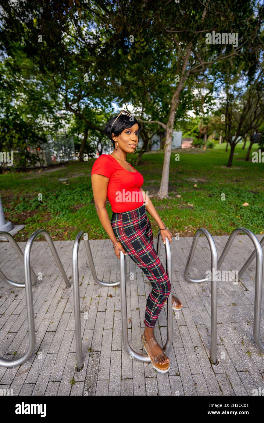 Photo of a beautiful female model posing outdoors in a park scene Stock ...