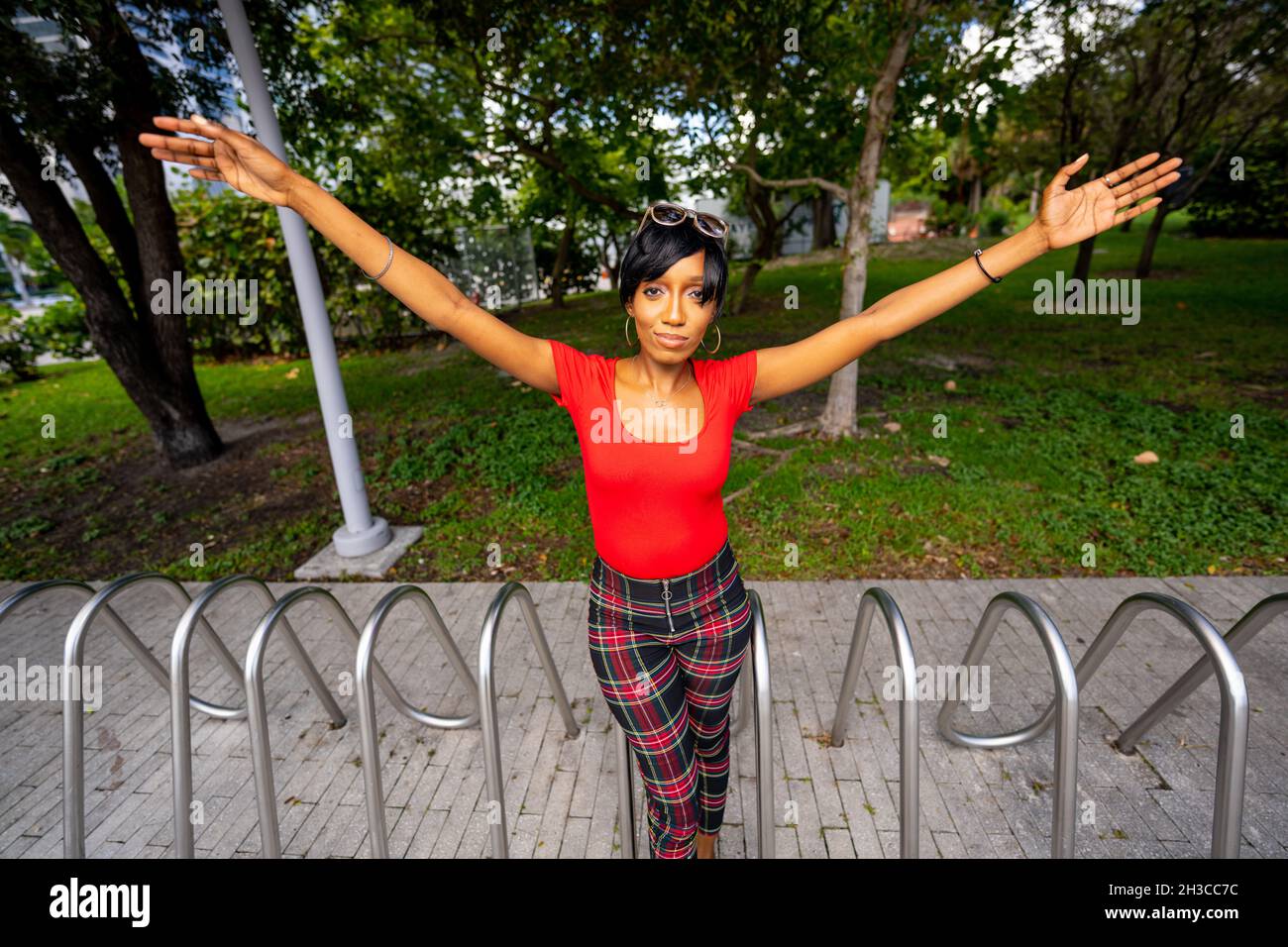 Photo of a beautiful female model posing outdoors in a park scene Stock ...