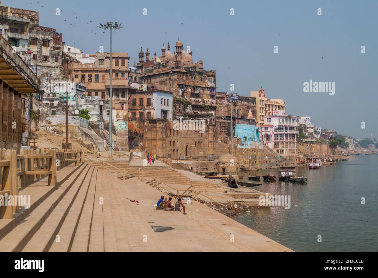 VARANASI, INDIA - OCTOBER 25, 2016: View of Ghats riverfront steps ...