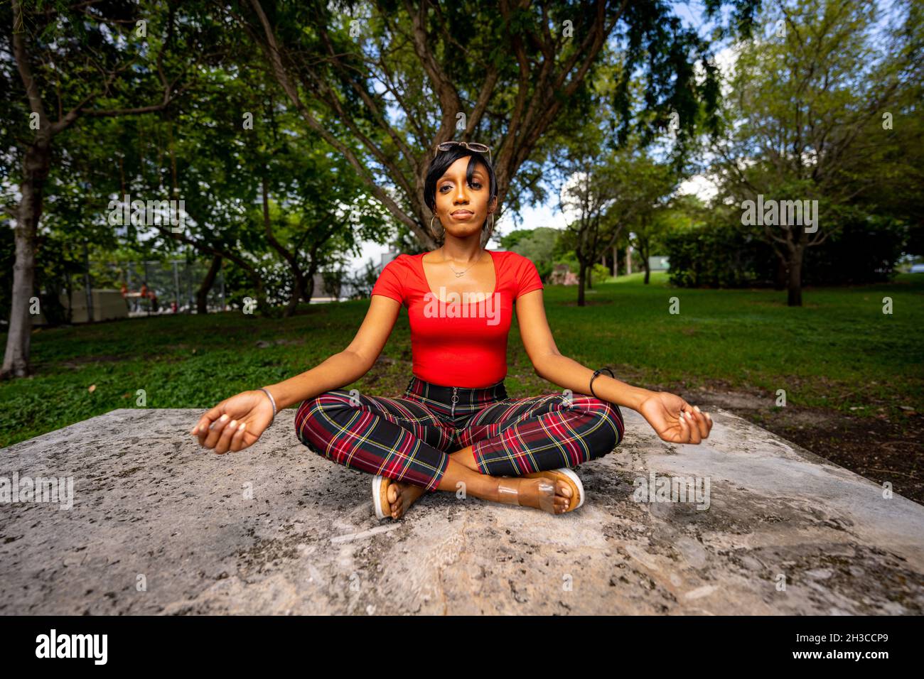 Photo of a beautiful female model posing outdoors in a park scene Stock ...