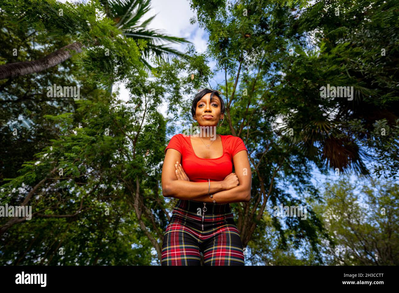 Photo of a beautiful female model posing outdoors in a park scene Stock ...