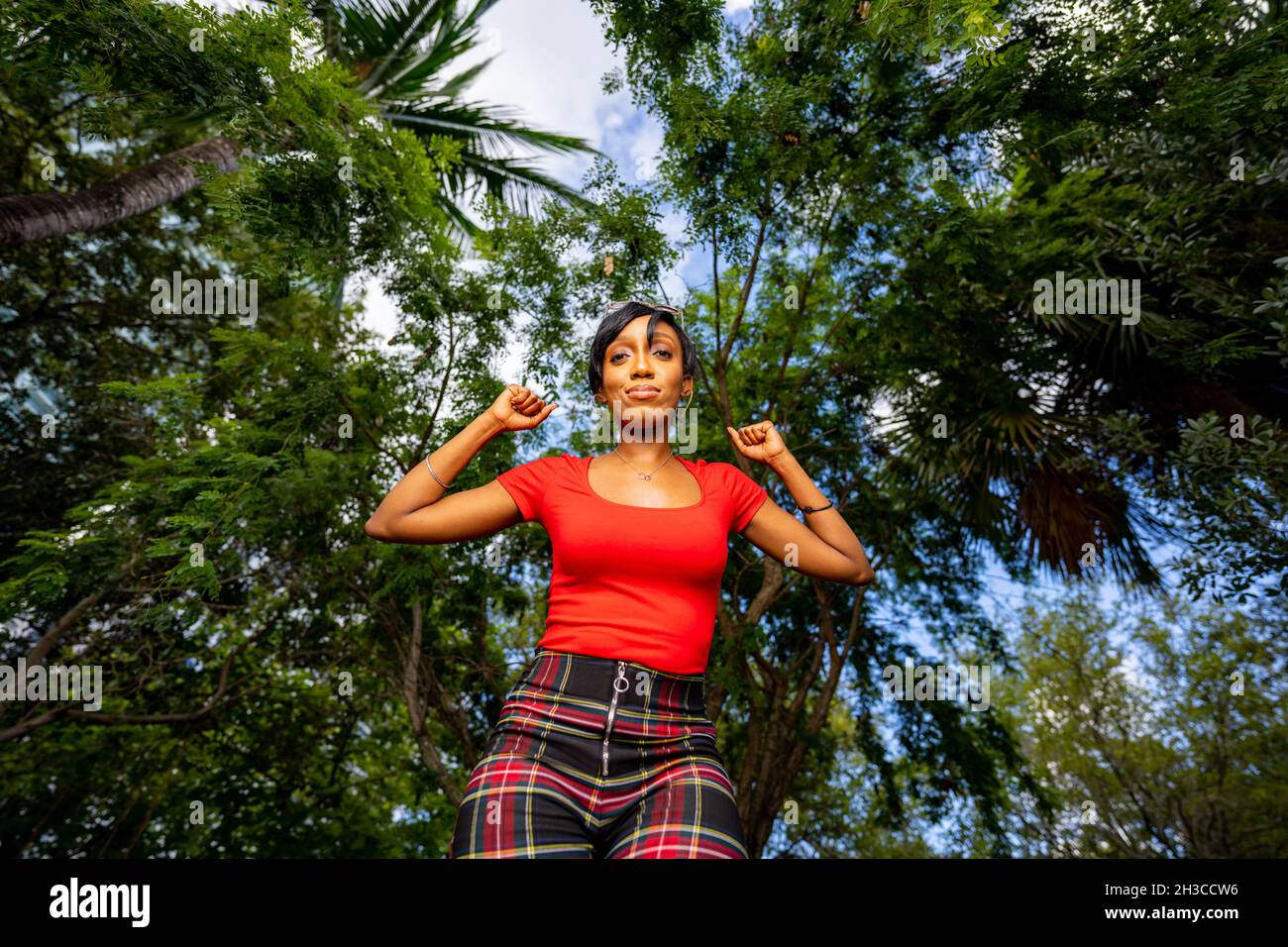 Photo of a beautiful female model posing outdoors in a park scene Stock ...