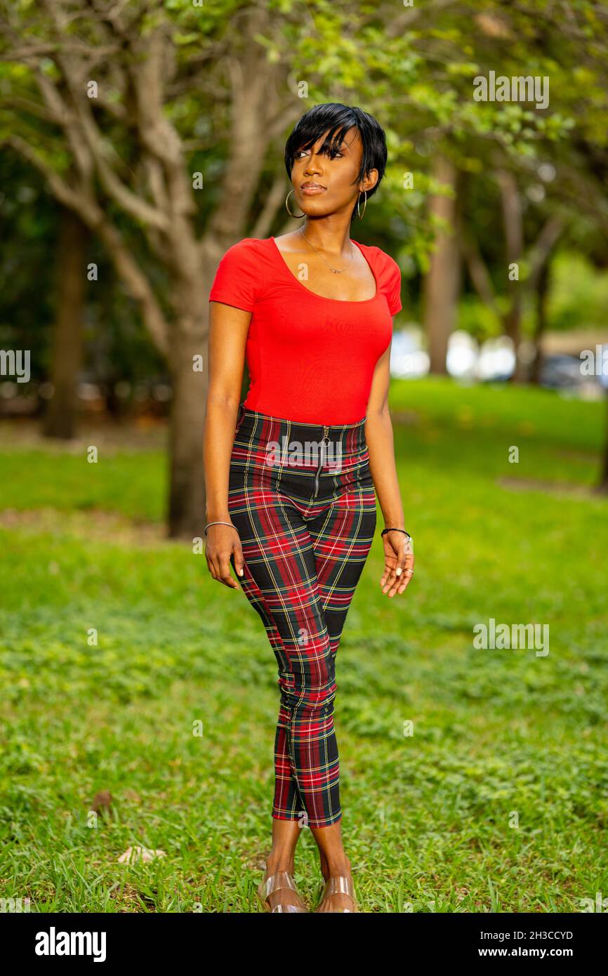 Photo of a beautiful female model posing outdoors in a park scene Stock ...