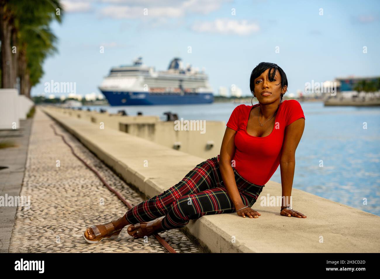 Photo of a beautiful female model posing outdoors in a park scene Stock ...