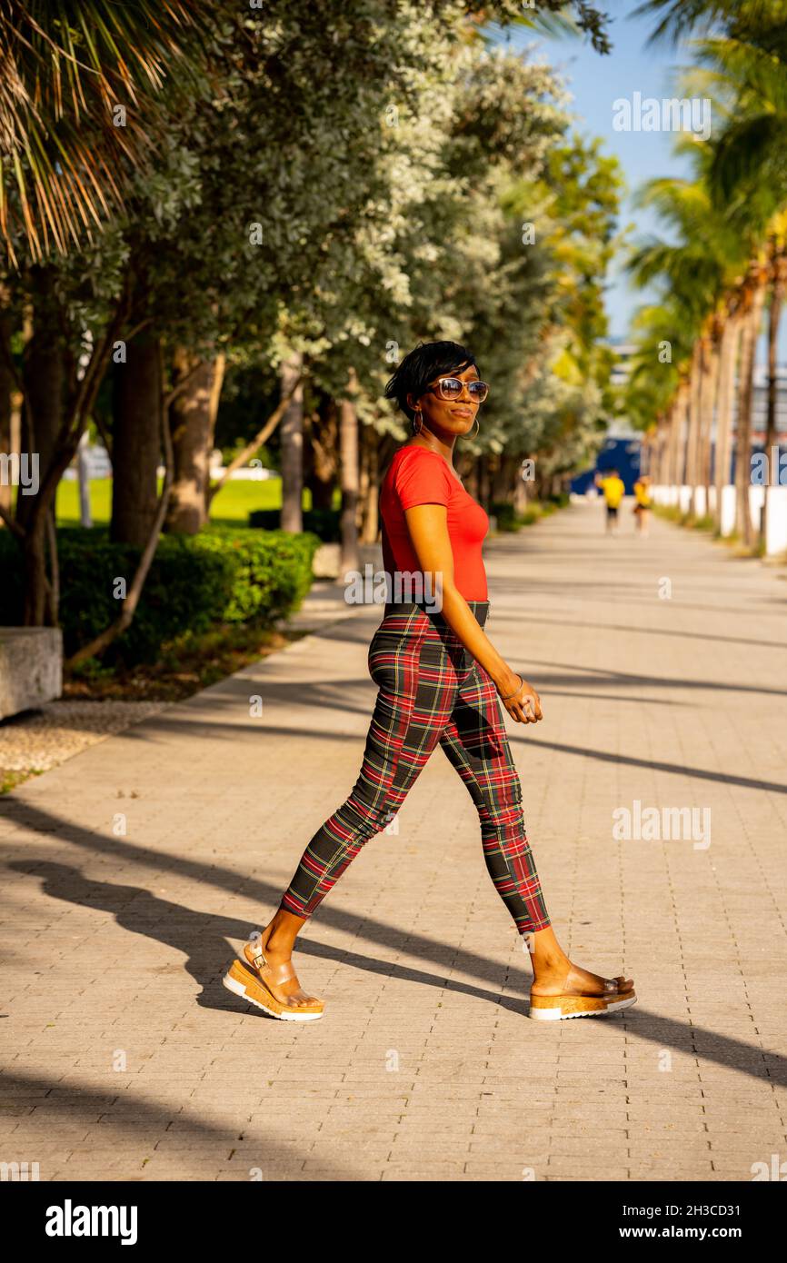 Photo of a beautiful female model posing outdoors in a park scene Stock ...