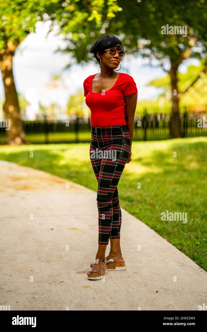 Photo of a beautiful female model posing outdoors in a park scene Stock ...
