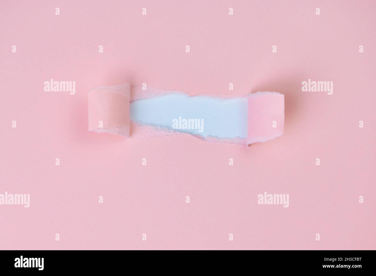 Paper torn down middle hi-res stock photography and images - Alamy