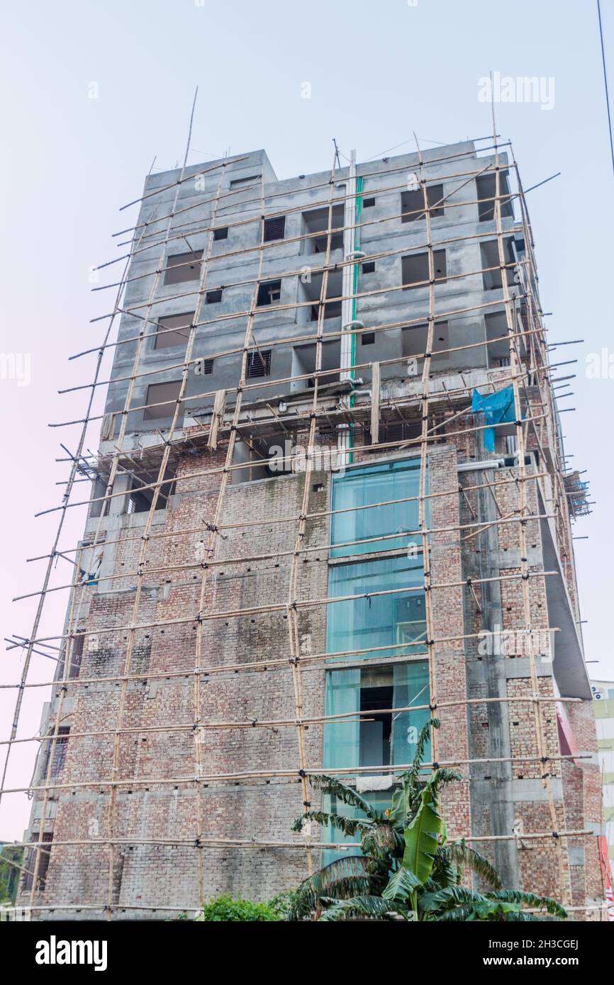 Building under construction using a bamboo scaffolding in Khulna ...