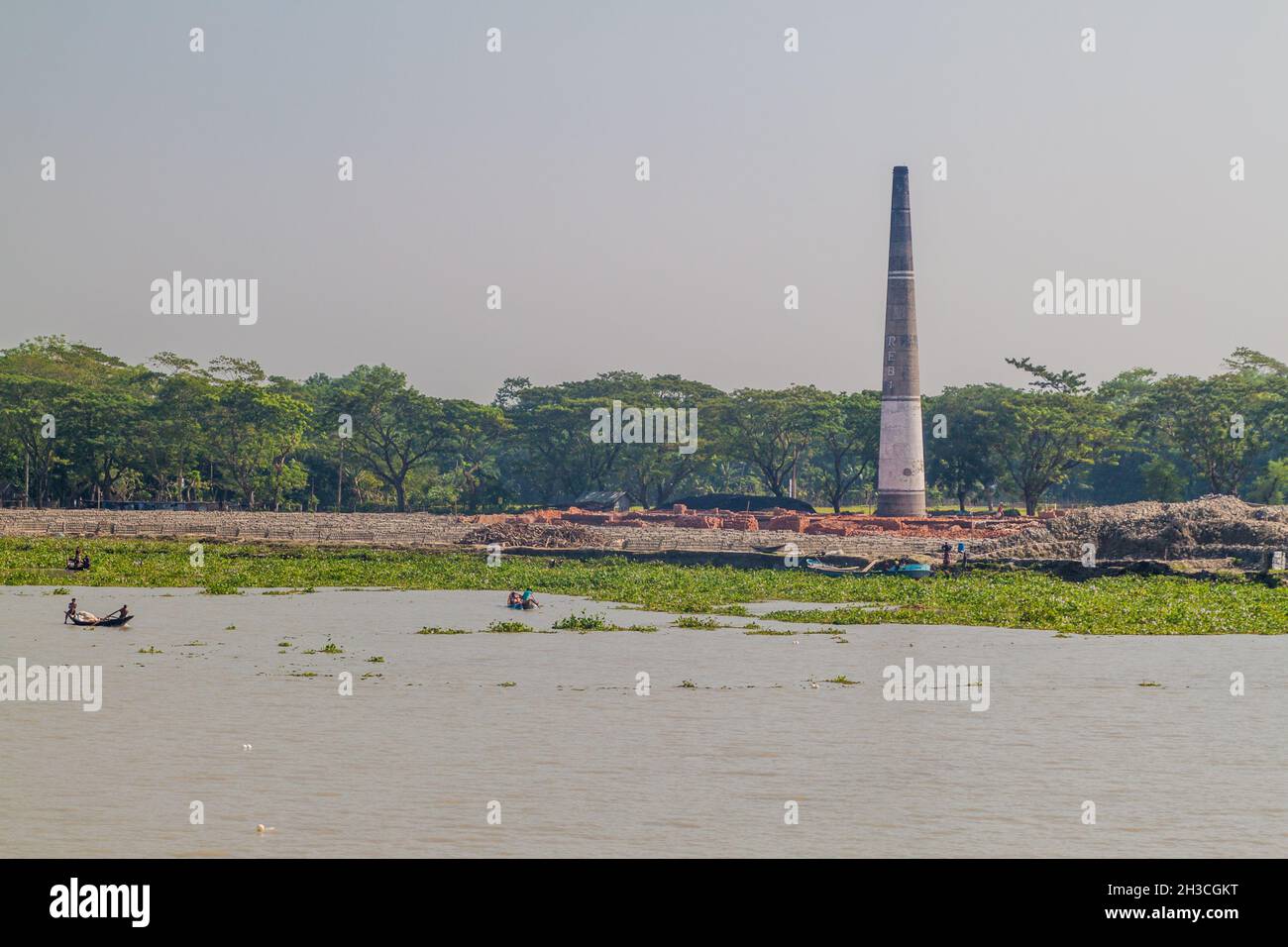 KATCHA RIVER, BANGLADESH - NOVEMBER 19, 2016: Brick factory on a coast ...