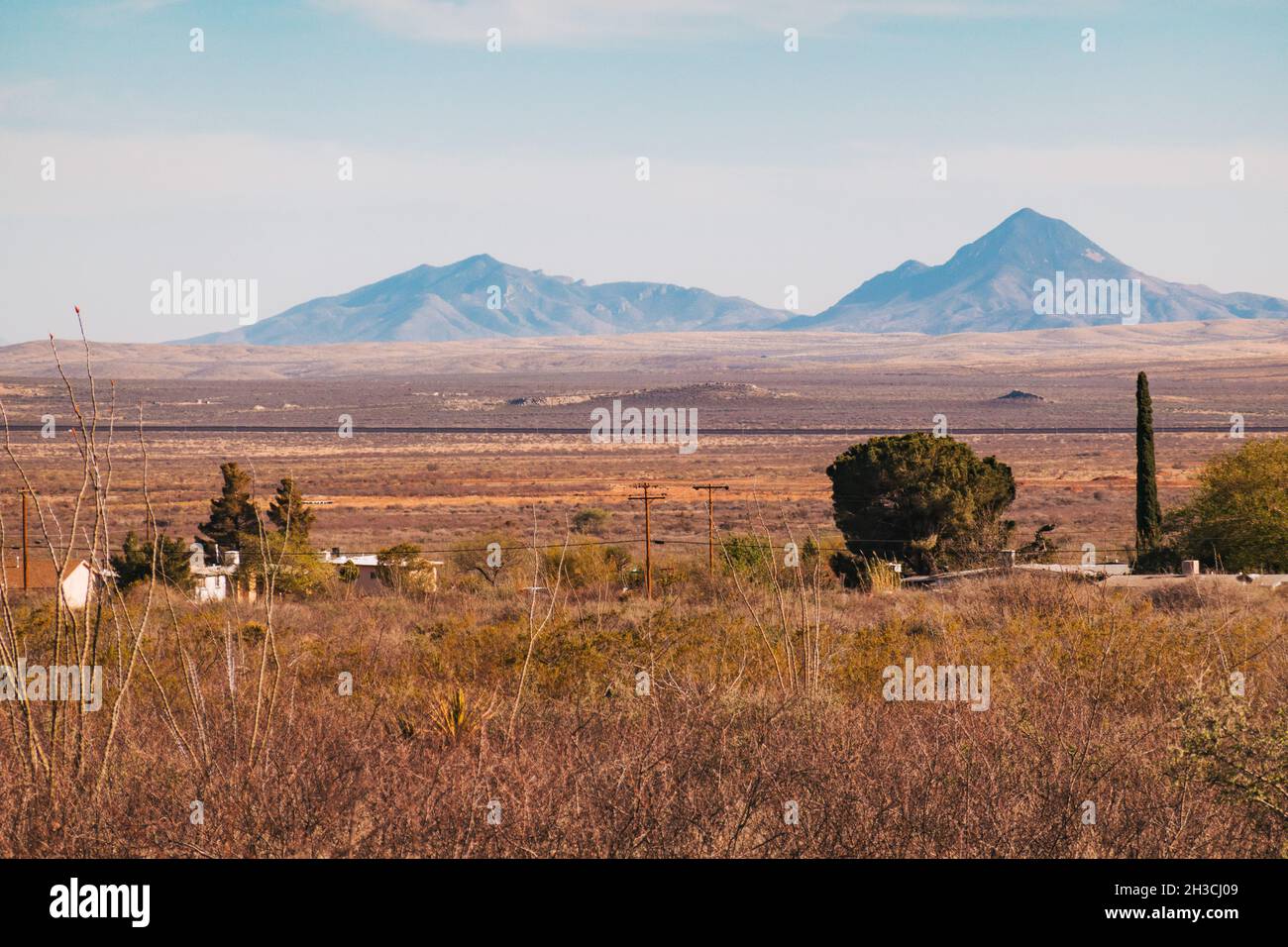 The steel US-Mexico border wall cuts a line through the plains near ...