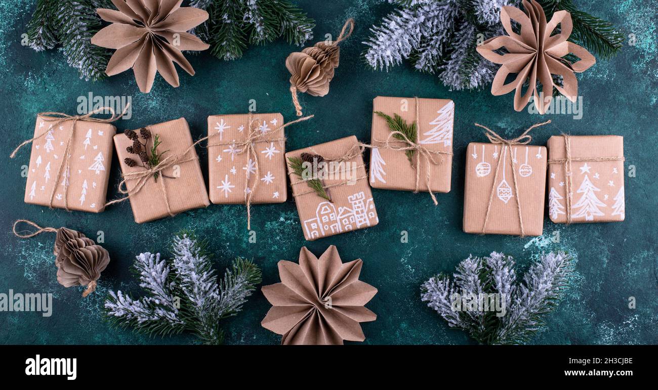 Christmas gift boxes in craft paper Stock Photo - Alamy