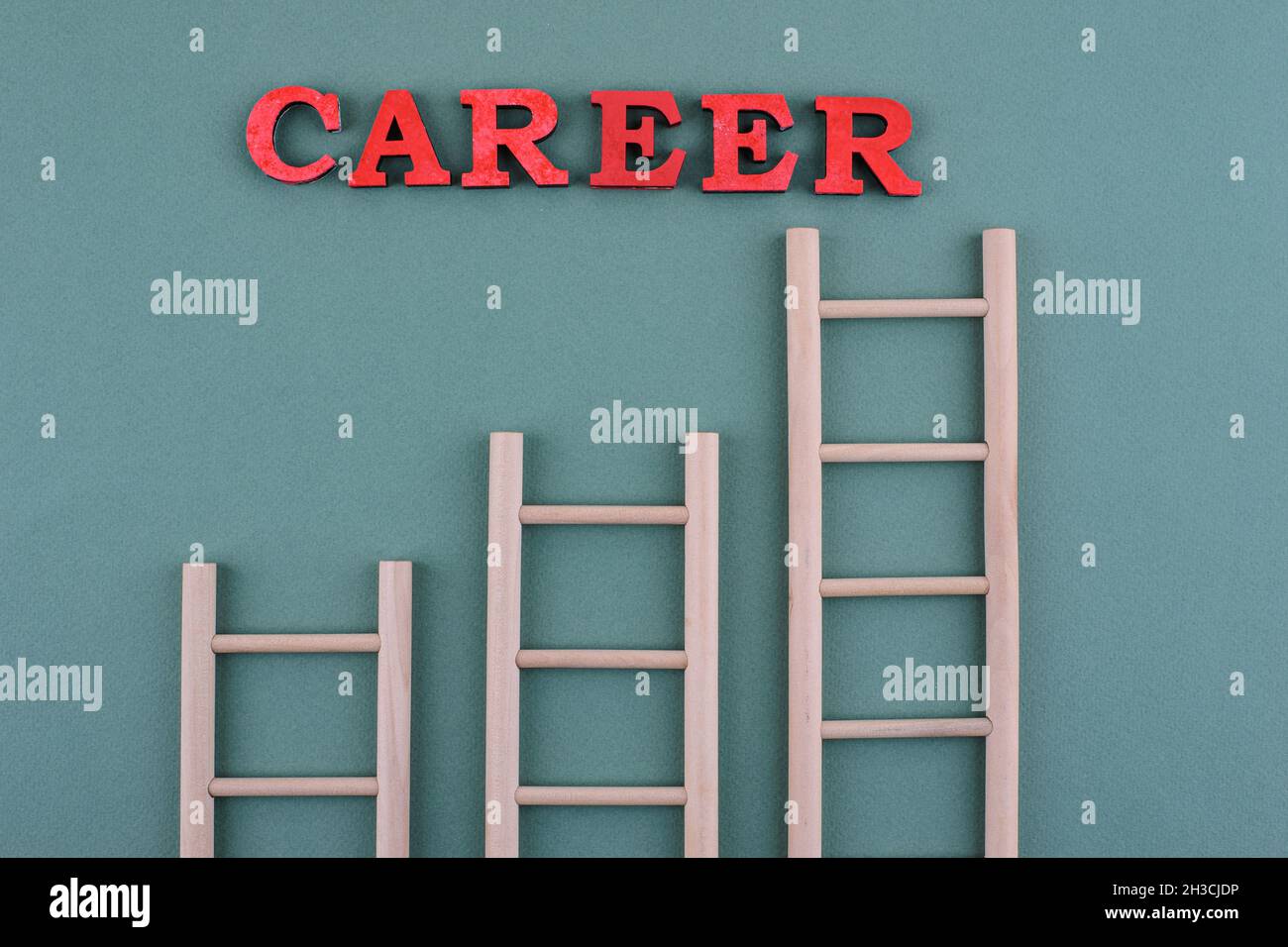 Career ladder concept with wooden stairs Stock Photo - Alamy