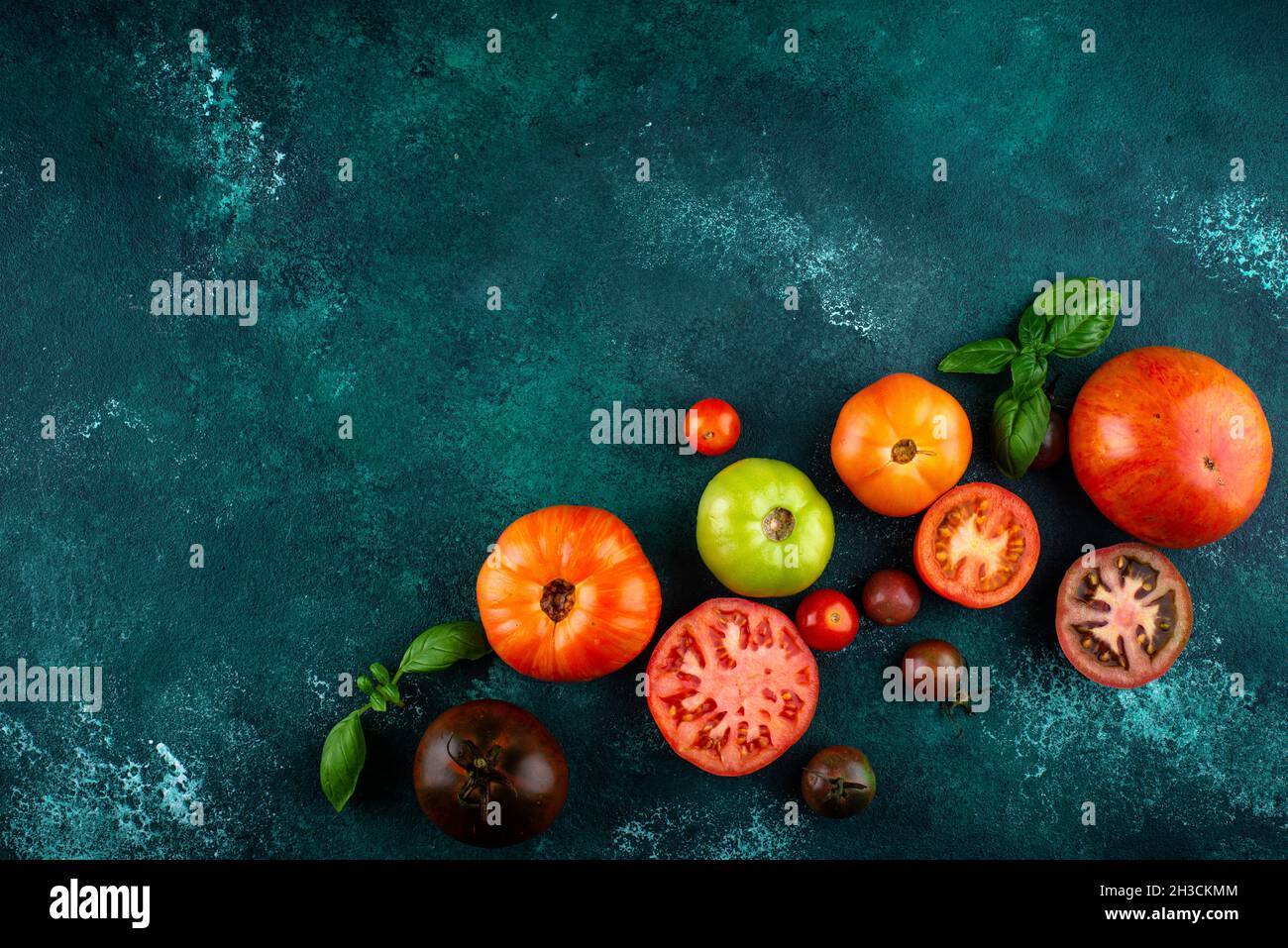 Assortment of different colorful tomatoes Stock Photo - Alamy