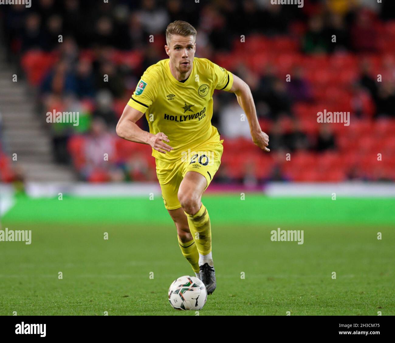 Kristoffer Ajer #20 of Brentford runs forward with the ball Stock Photo ...